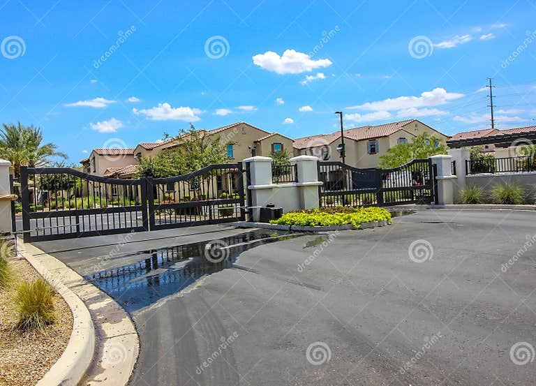 Entrance and Exit Gates at Secure Subdivision Stock Photo - Image of ...