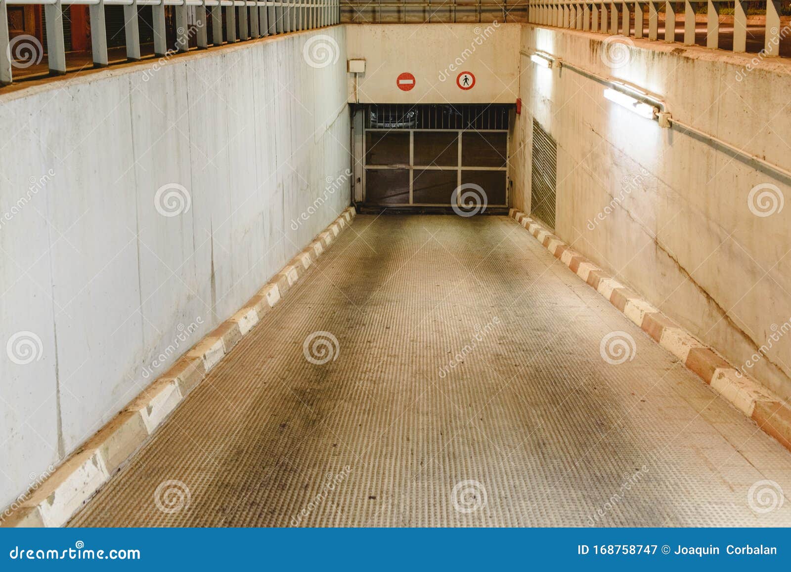 Entrance in Ramp To an Underground Parking Stock Image - Image of large ...