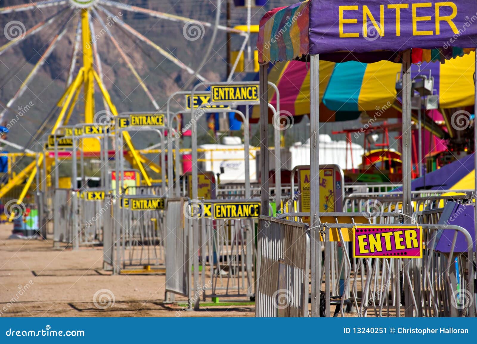 Entrance to carnival rides stock image. Image of wheel - 13240251