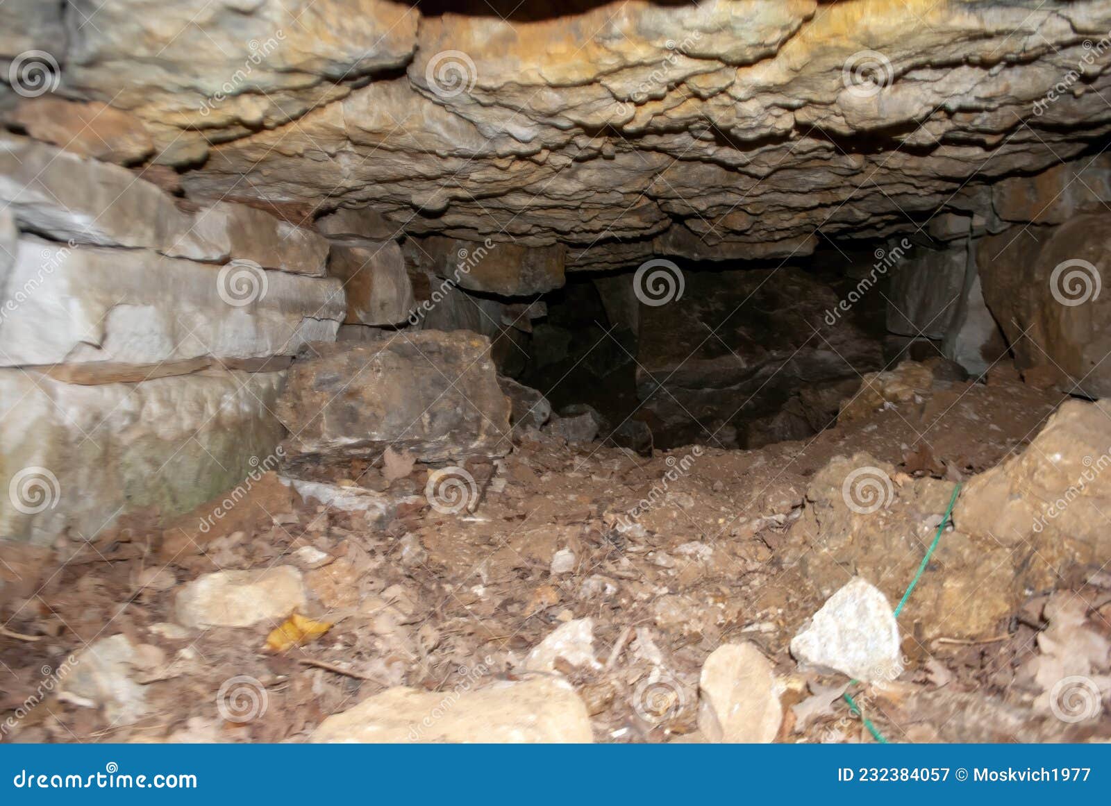 Entrance to a small cave stock image. Image of outdoor - 232384057