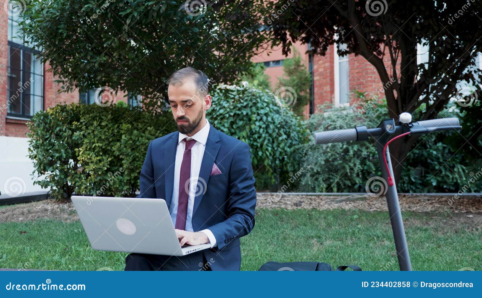 Entrepreneur Looking at Laptop Computer Screen Working at Management ...