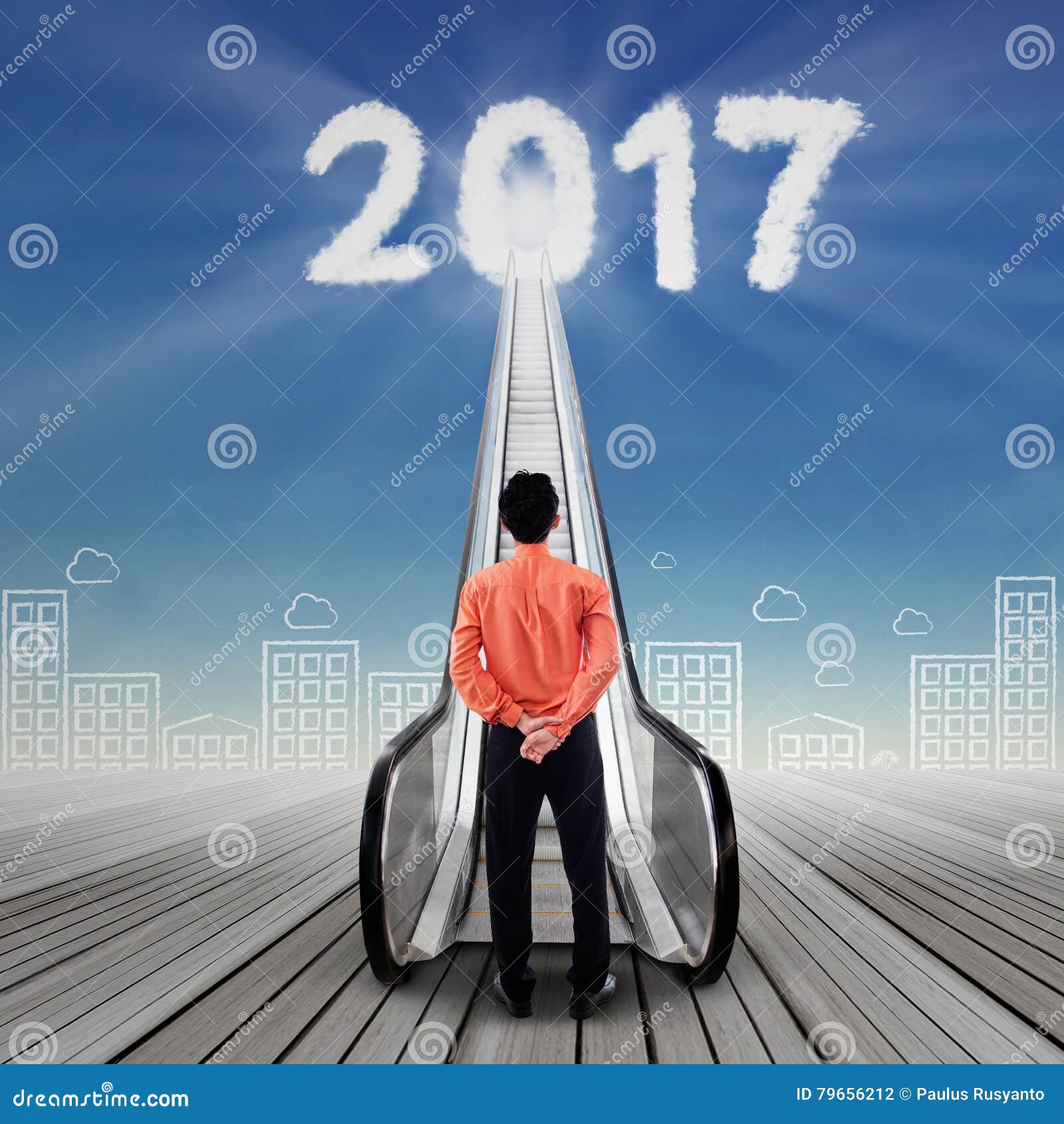 Entrepreneur Looking at Numbers 2017 with the Cityscape Stock Photo ...