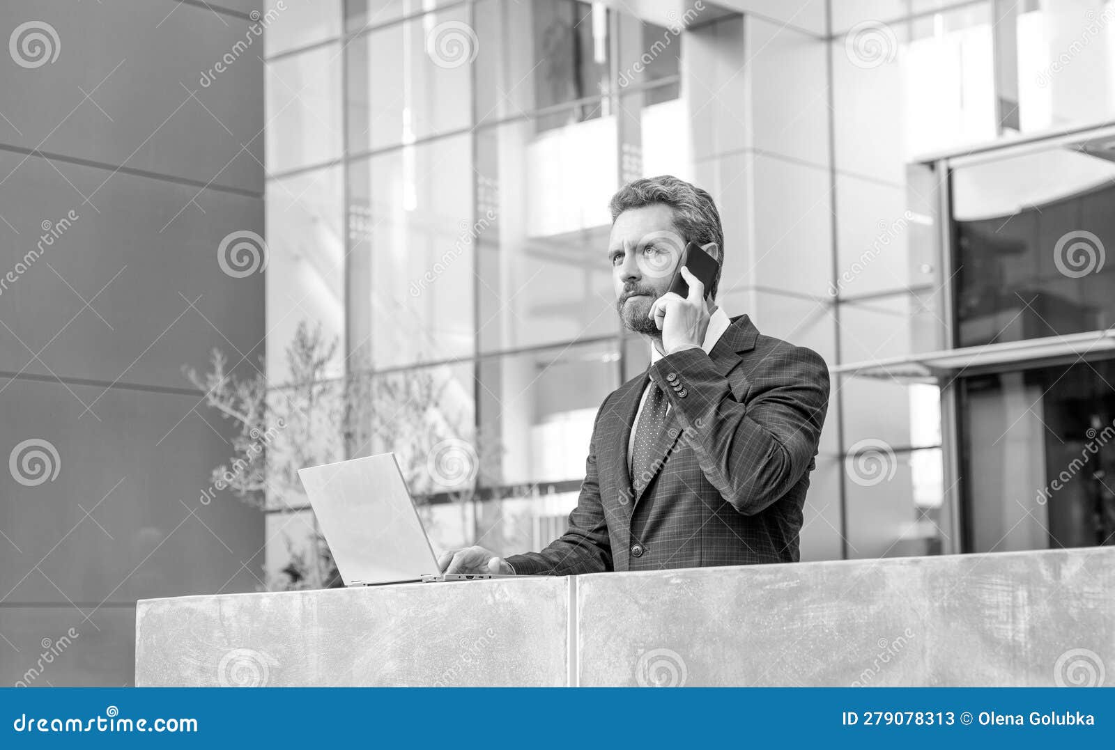 Entrepreneur in Suit Has Phone Conversation while Using Pc Outside the ...