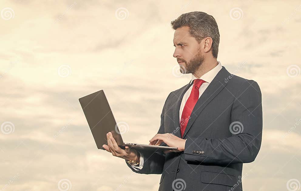 Entrepreneur in Suit Using Laptop on Sky Background Stock Image - Image ...