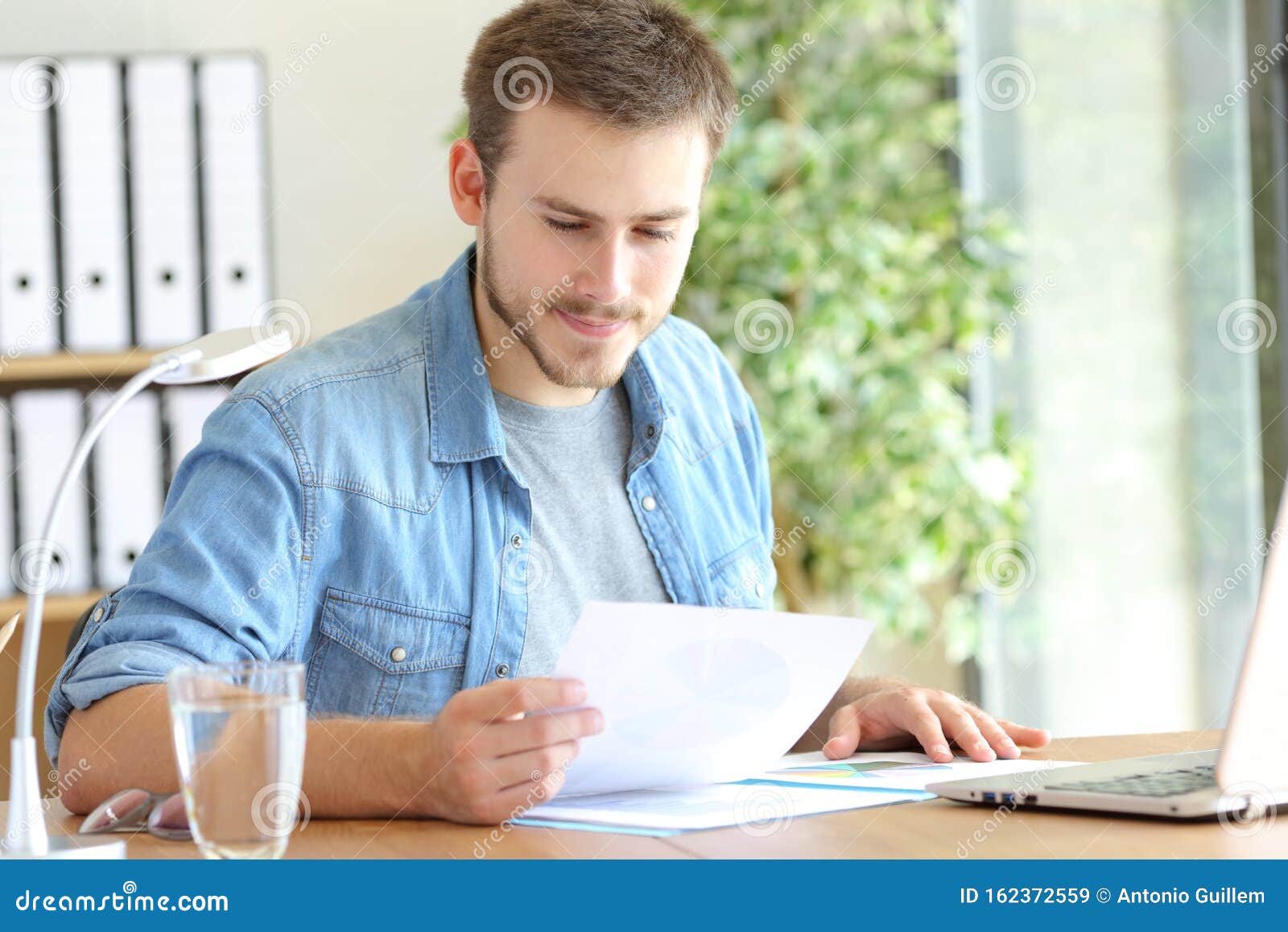 Entrepreneur Working Reading Paper Document at Office Stock Image ...