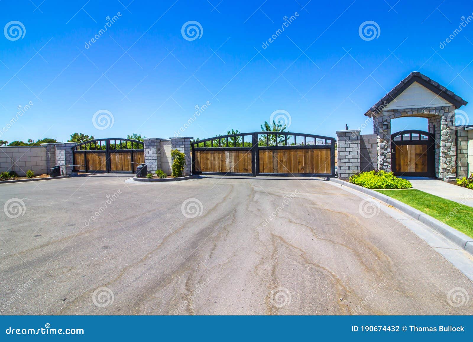 Entry/Exit Automatic Wooden Gates with Separate Pedestrian Gate Stock ...