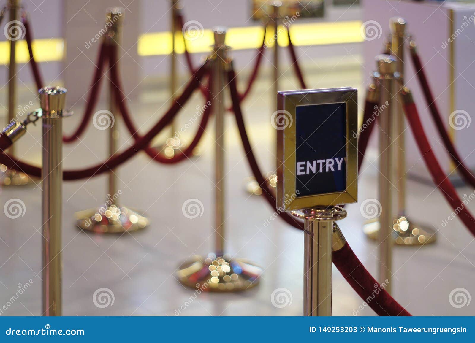 Entry / Exit Sign Against Rope Barrier Stanchion Queue Rope Barrier ...
