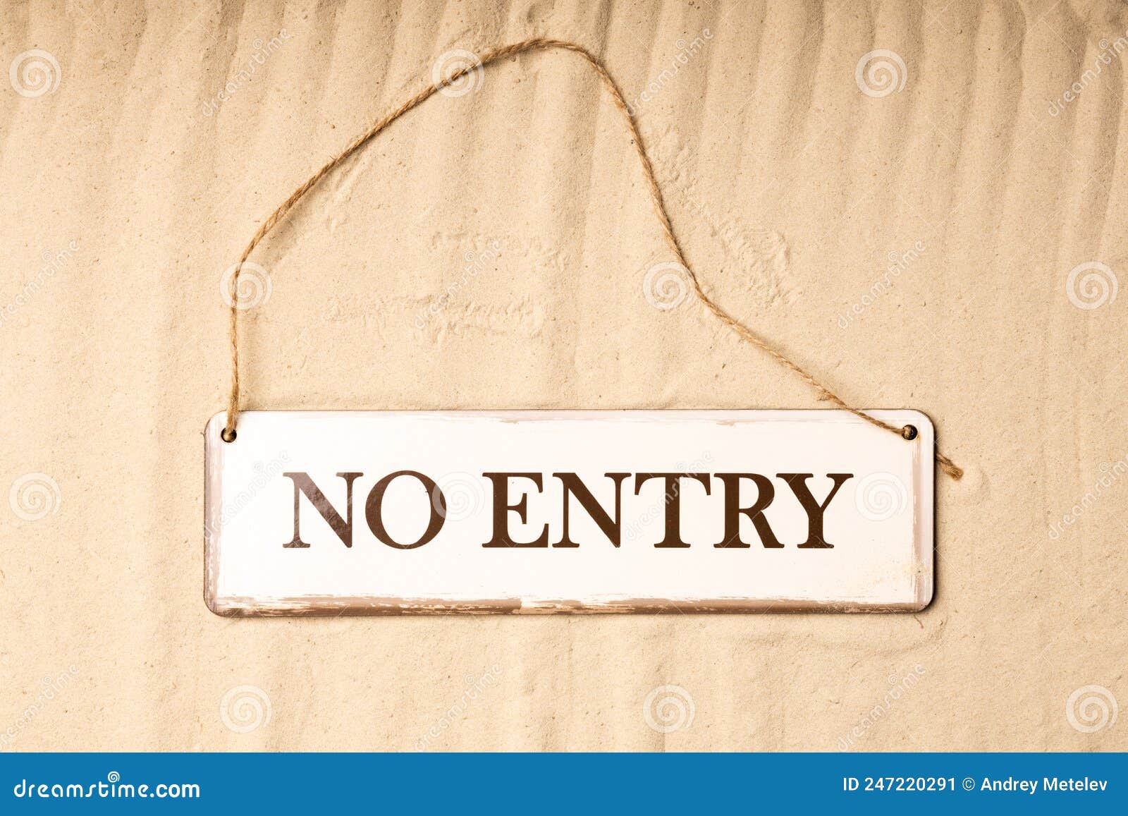 Entry is Prohibited is Written on the Sign Which is Located on the Sand ...