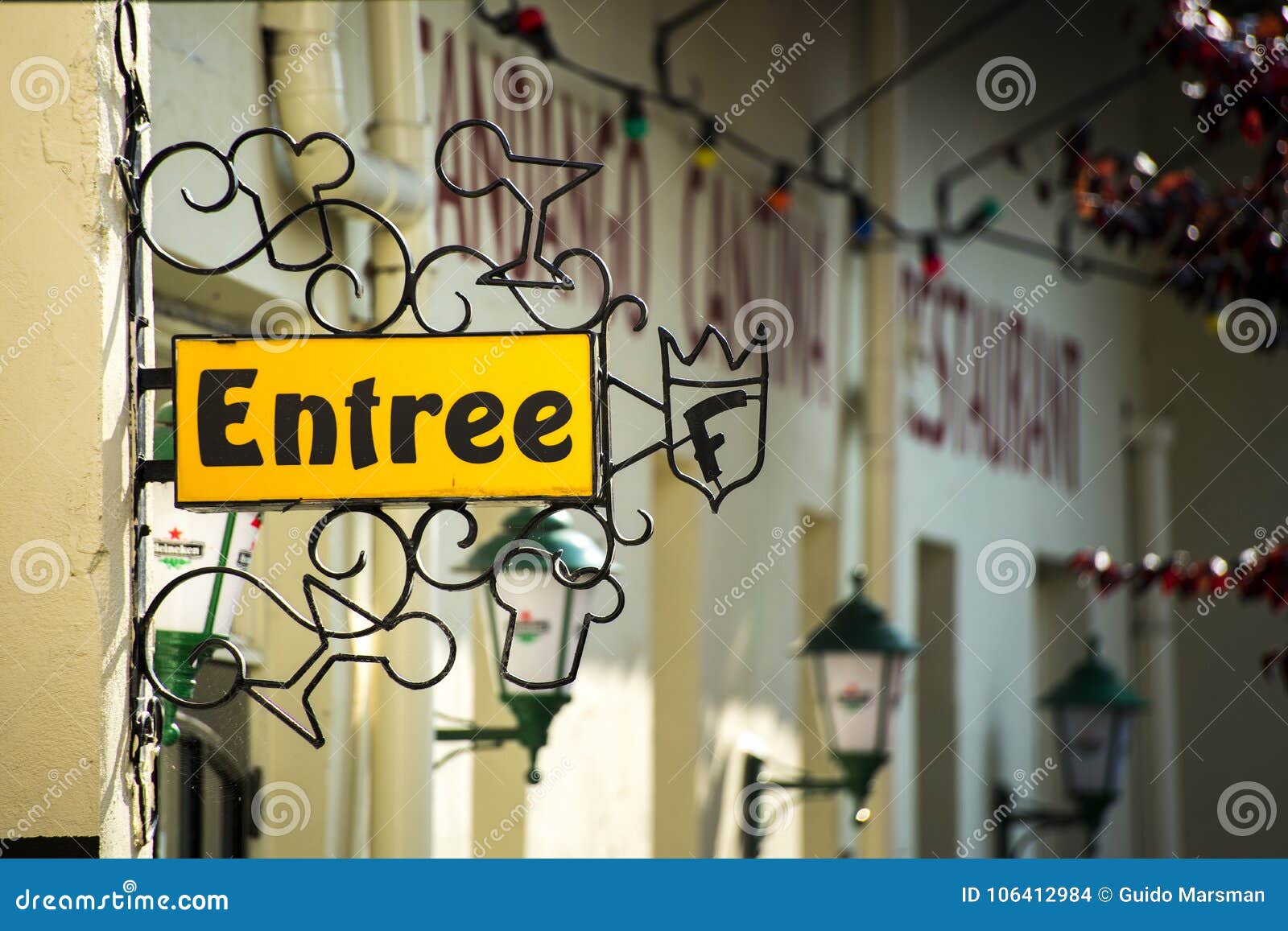 A Entry Sign Saying ``Entree`` on a Yellow Sign Editorial Stock Image ...