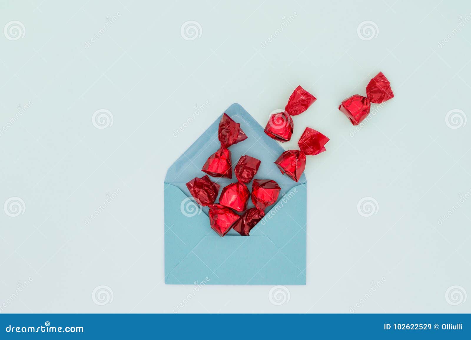 Envelope with Chocolate Sweets in Red Wraps Stock Image - Image of ...