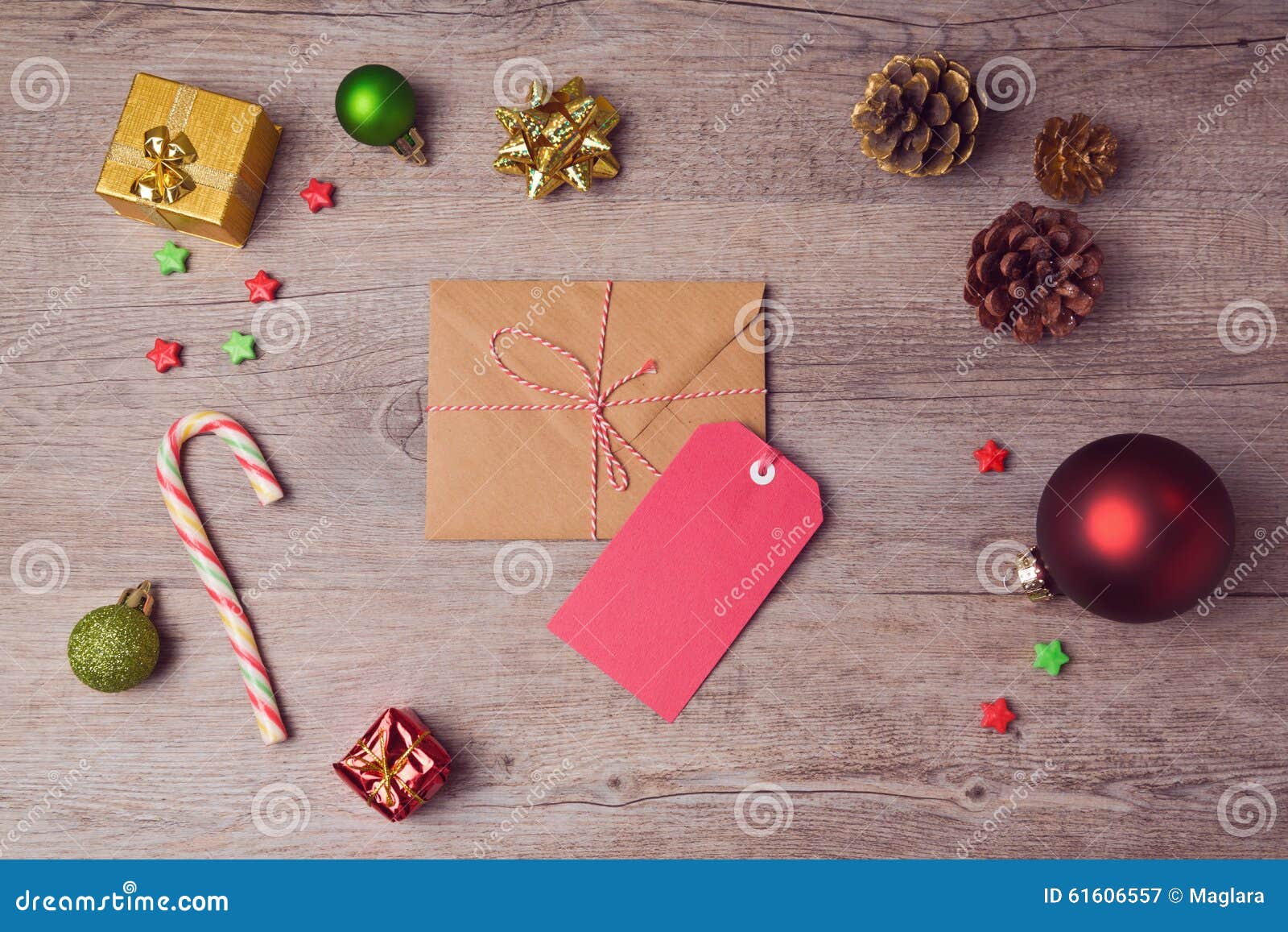 Envelope and Gift Tag with Christmas Decorations on Wooden Background ...