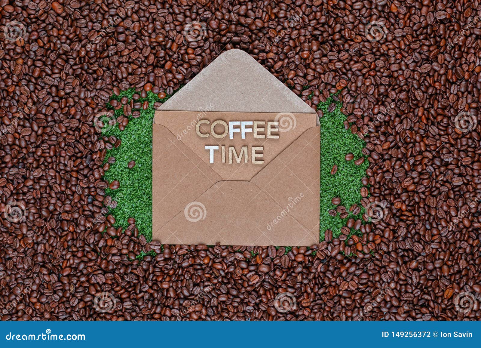 Envelope on Grass Background with Coffee Beans Above, Aligned in the ...