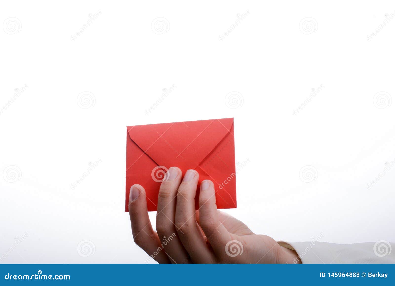 Envelope in hand stock photo. Image of mail, holding - 145964888
