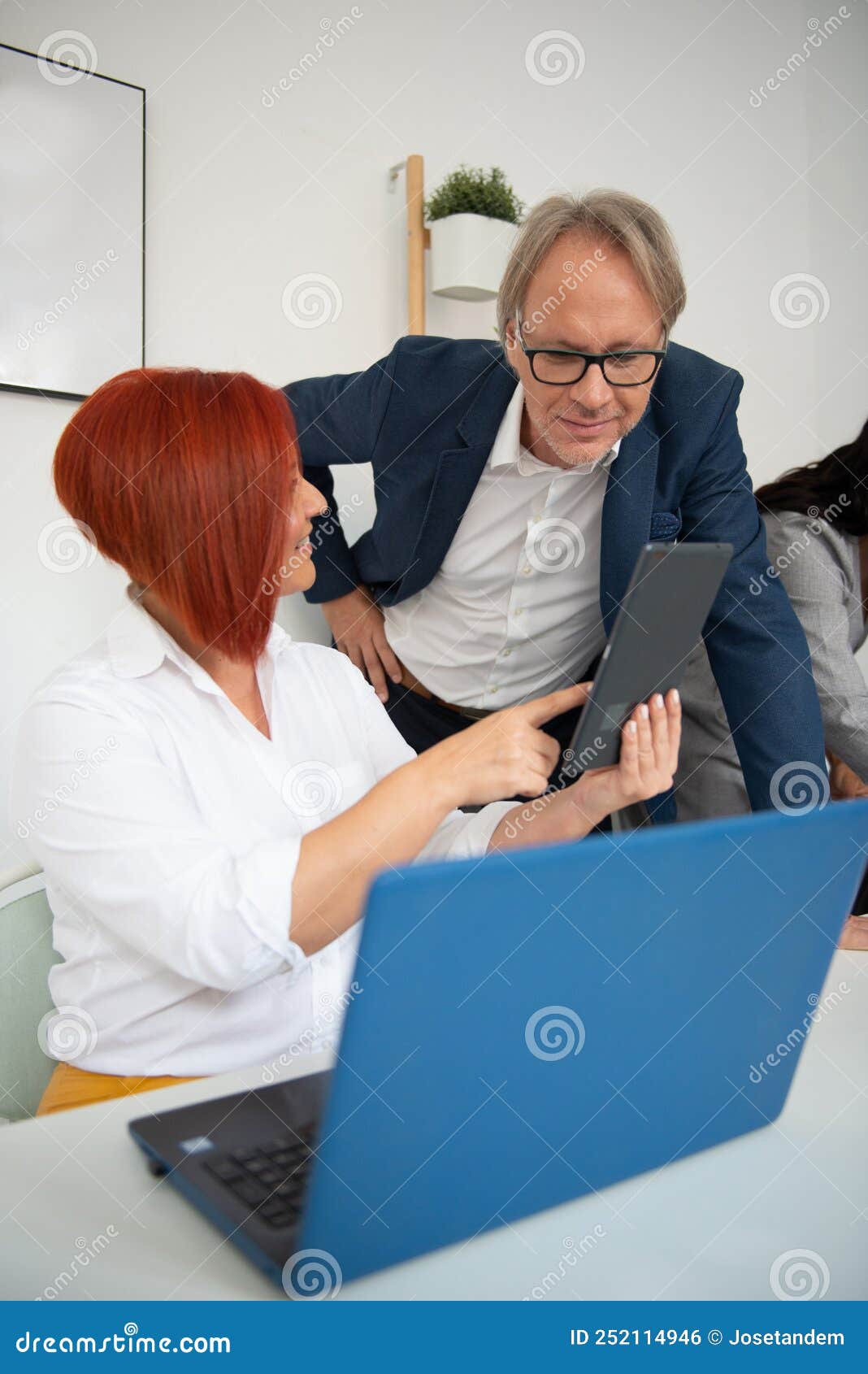 Environment of Workers in Their Workplace Consulting Their Computers and Balance Sheets Stock ...