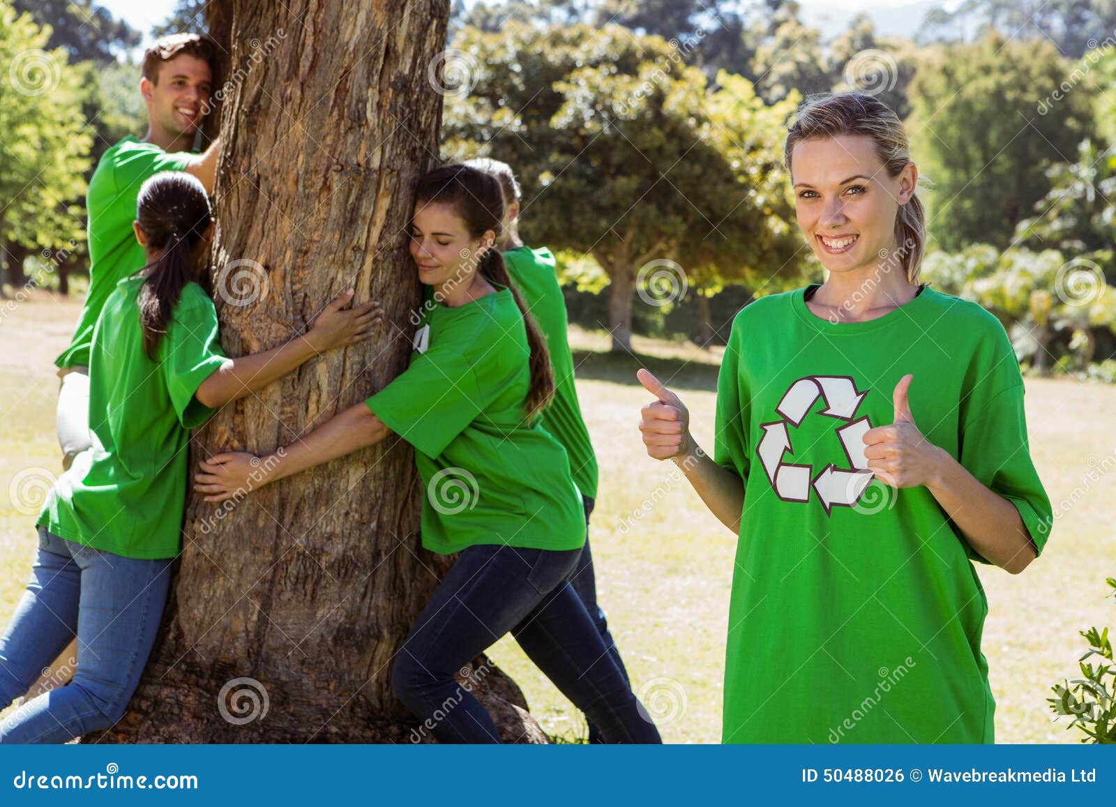 Environmental Activists Hugging a Tree in the Park Stock Photo - Image ...