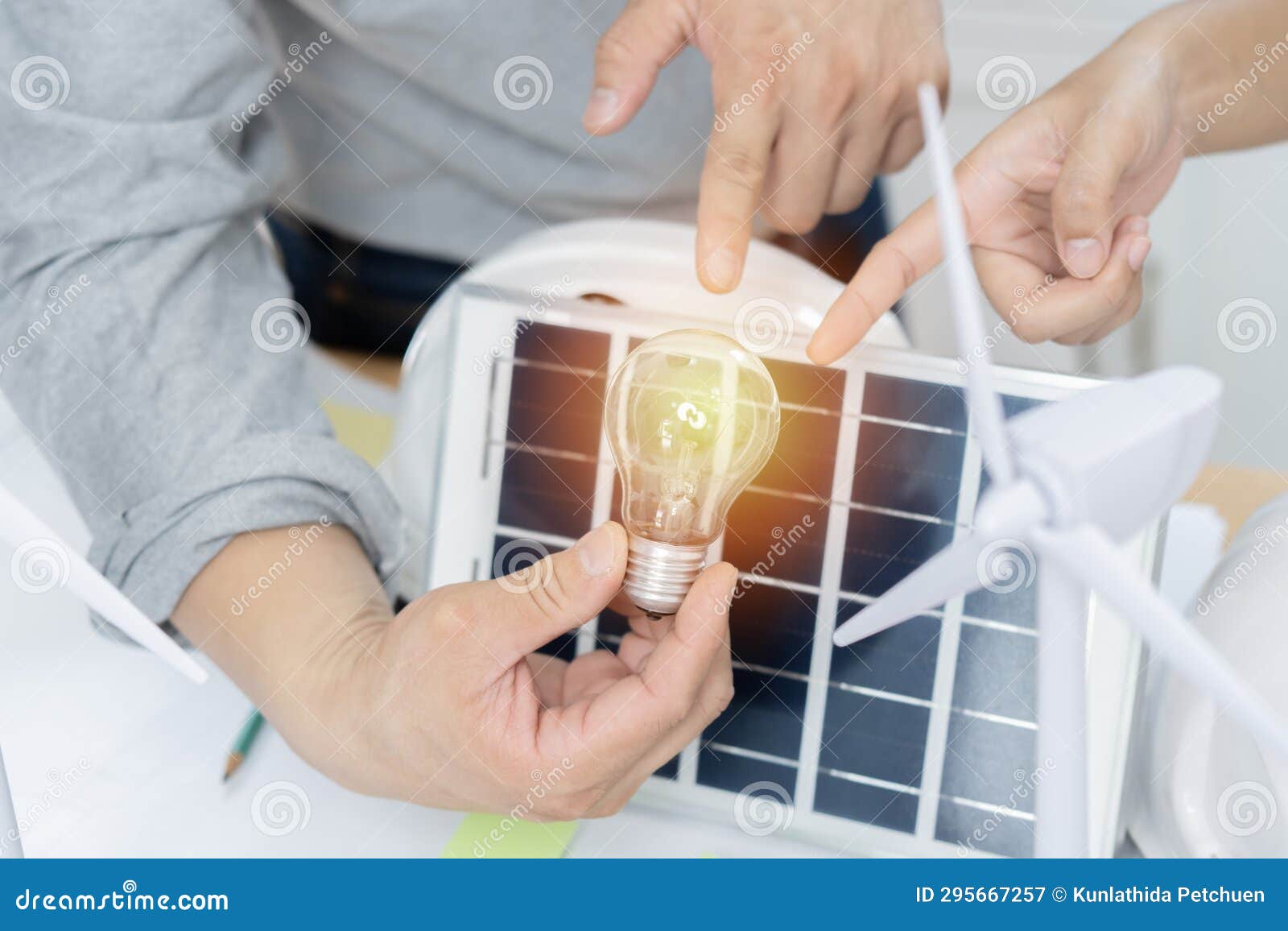 Environmental Engineer Holding and Pointing Light Bulb in Modern Office ...