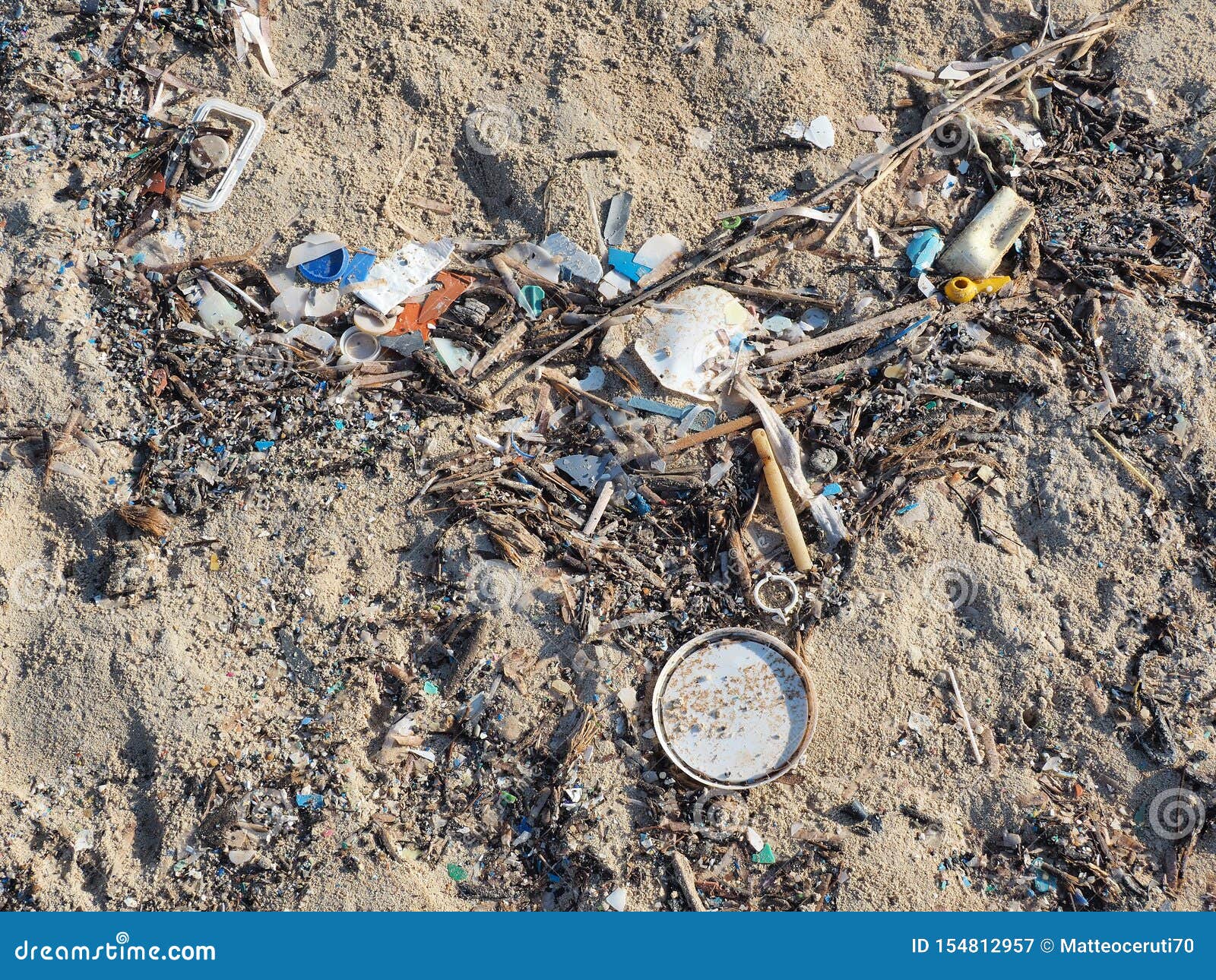 Environmental Pollution. Sand Beaches Polluted with Pieces of Plastic ...