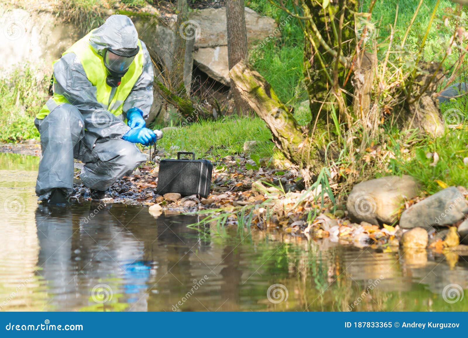 Environmental Pollution Scientist in Protective Suit Adjusts Rubber ...