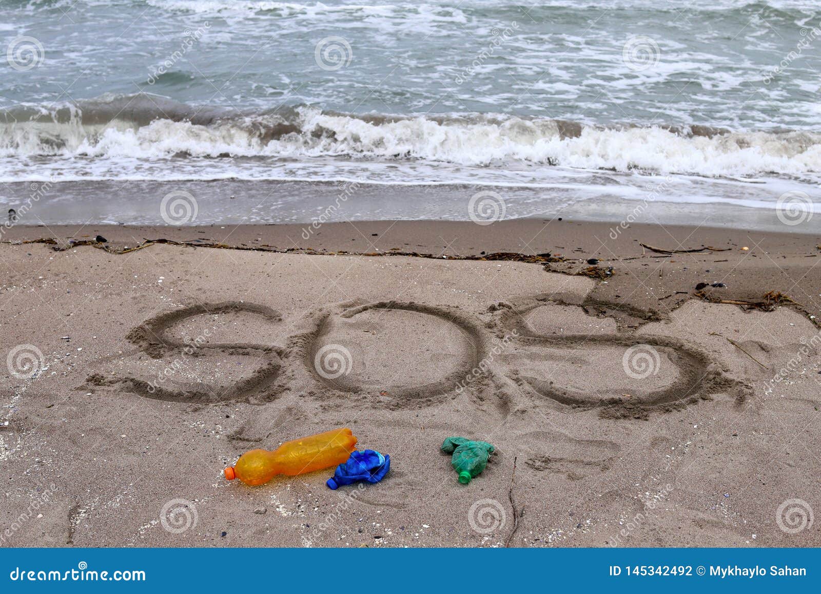 Environmental Problem. Ecology Concept. Plastic on the Beach with Sos ...