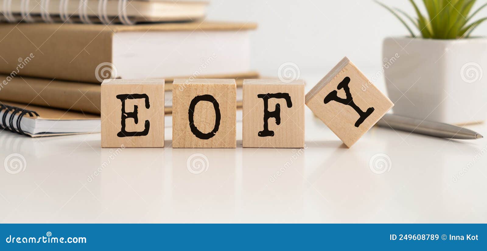 EOFY, End of Financial Year Text. Wood Cubes and White Background Stock ...