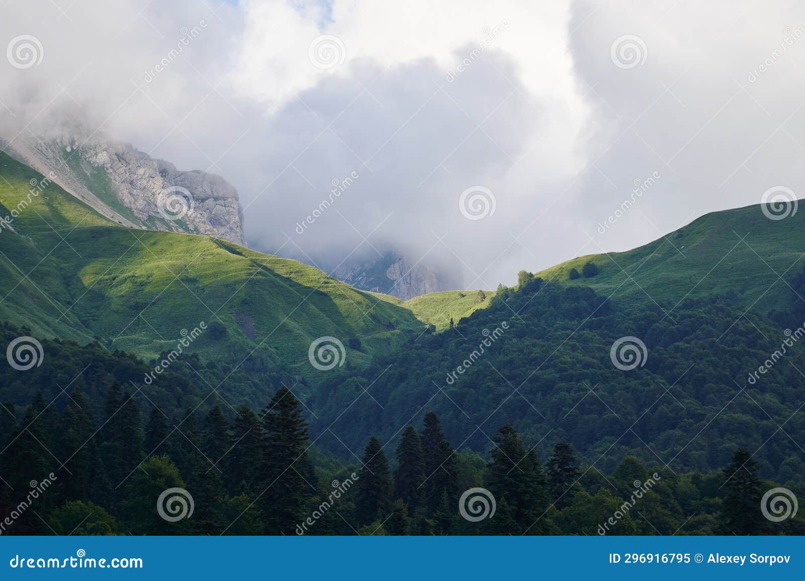 Epic Mountain Landscape with a Pass Covered with Clouds and Forest ...