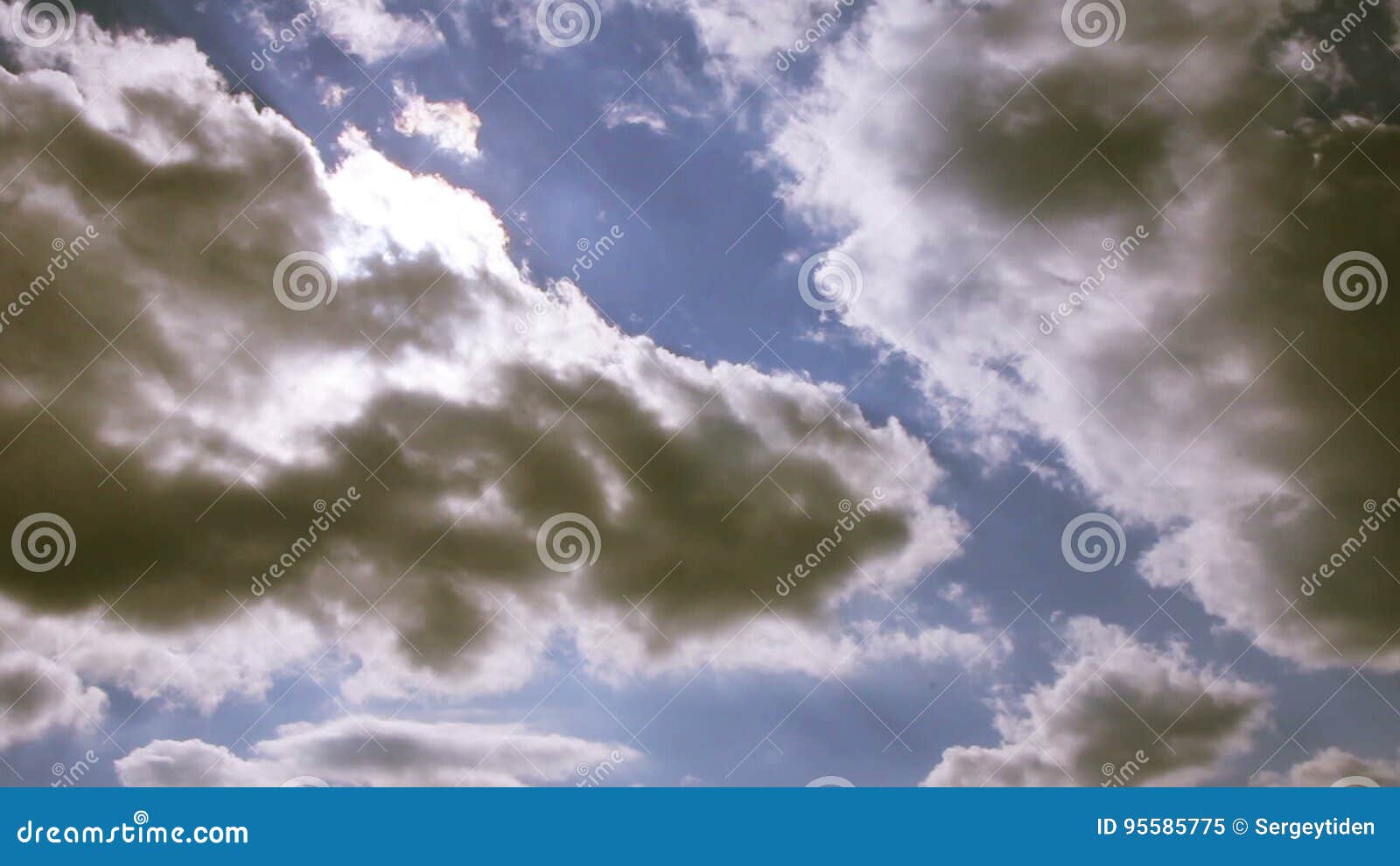 Epic Sky with Large Clouds and Sun Beams through Clouds Stock Video ...