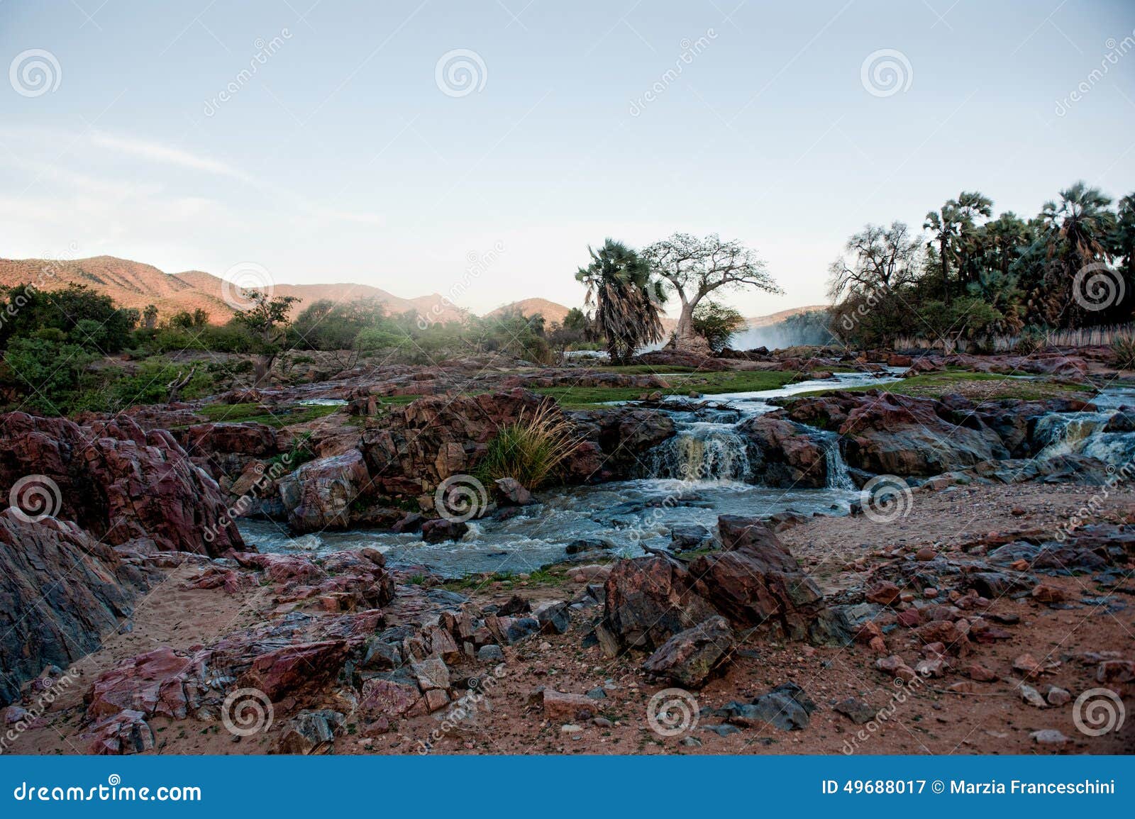 Epupa Falls Waterfall With Baobab Trees At The Border Of Namibia And ...