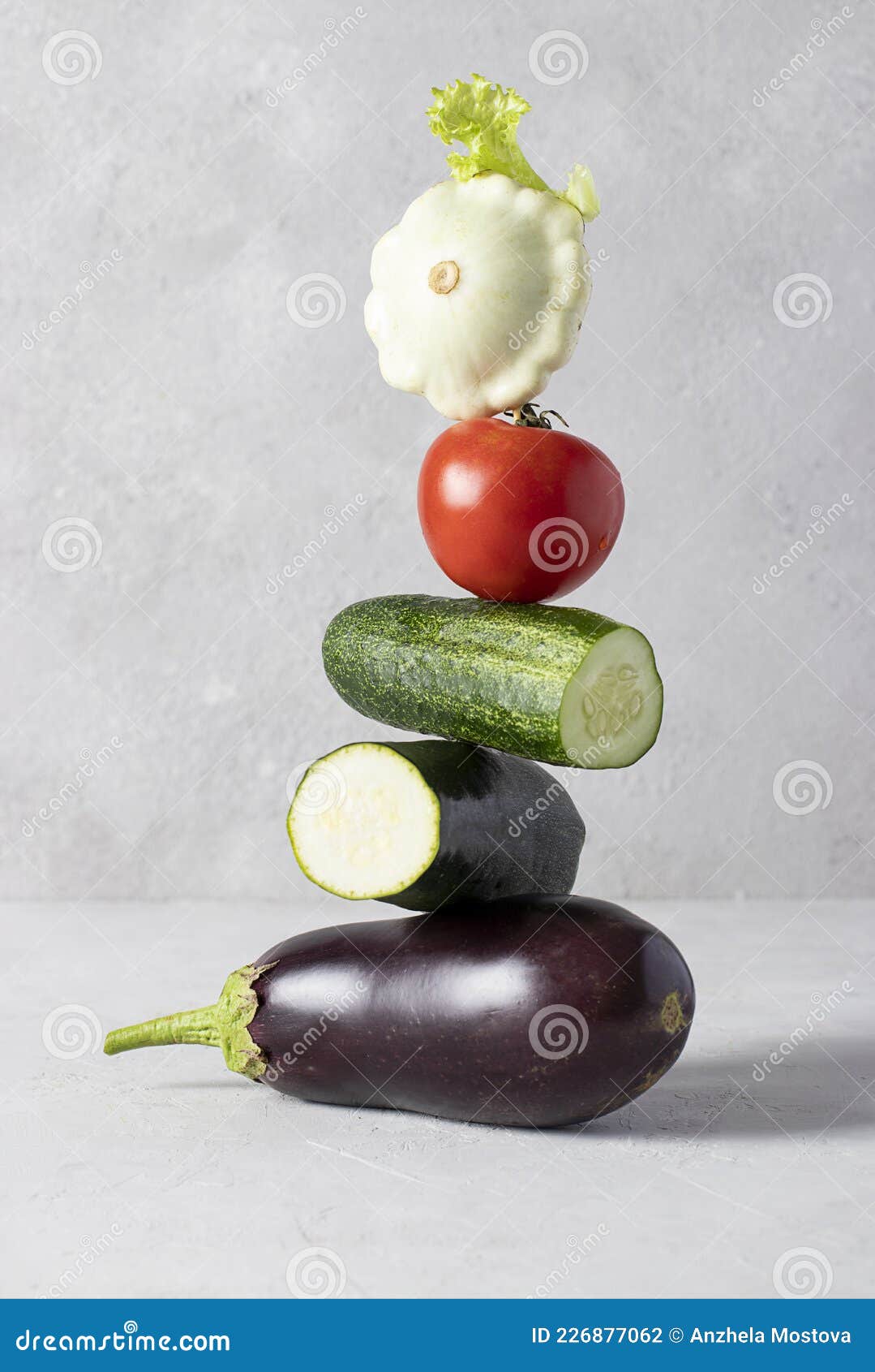 Equilibrium Floating Fresh Vegetables on Gray Background. Vertical ...