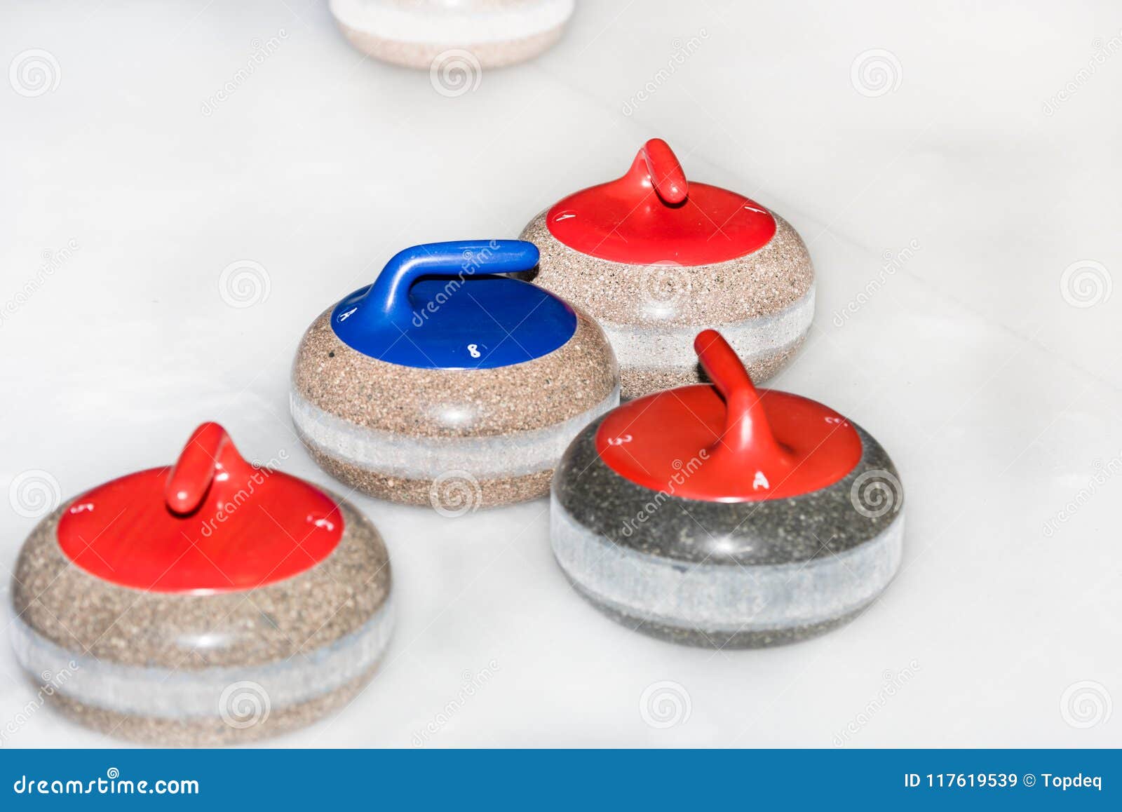 Curling stones on the ice stock image. Image of curling - 117619539