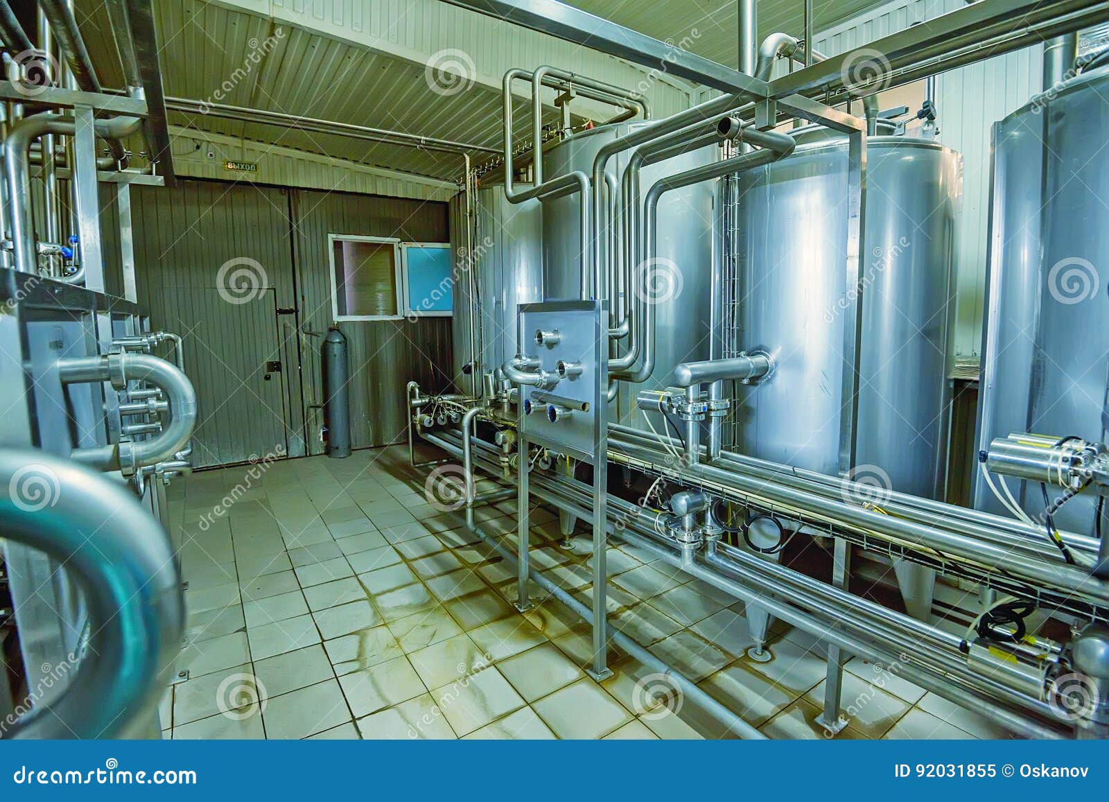 Equipment at dairy plant stock image. Image of metal - 92031855