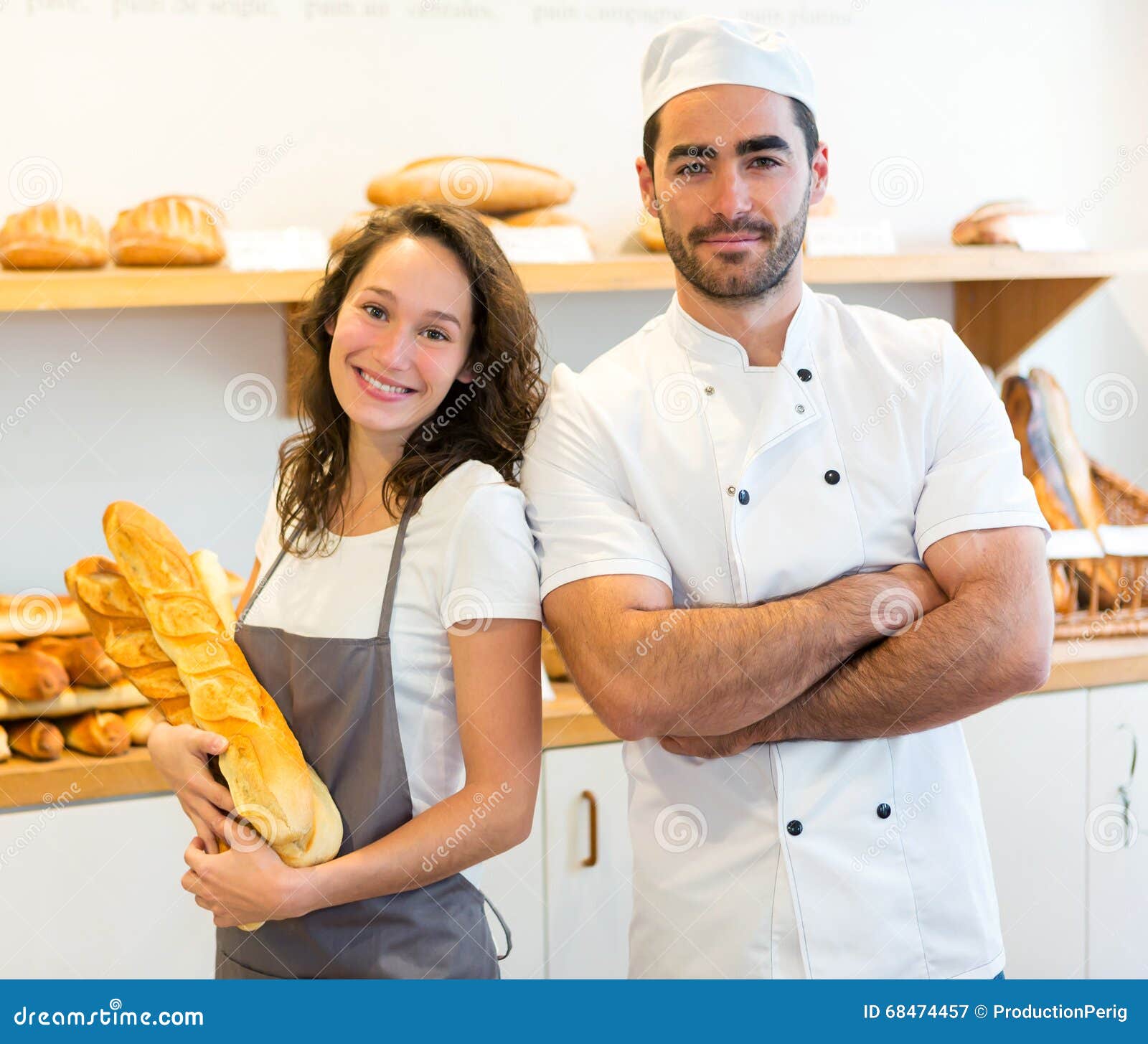 Equipo De Panaderos Que Trabajan En La Panadería Imagen de archivo ...