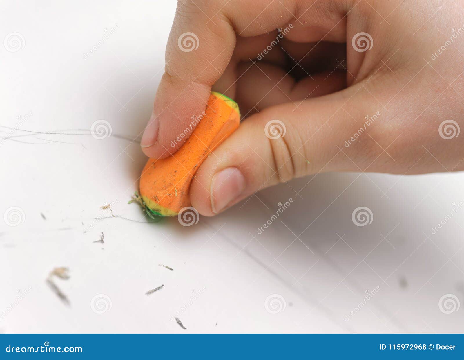 Erasing rubber in a hand stock photo. Image of eraser - 115972968