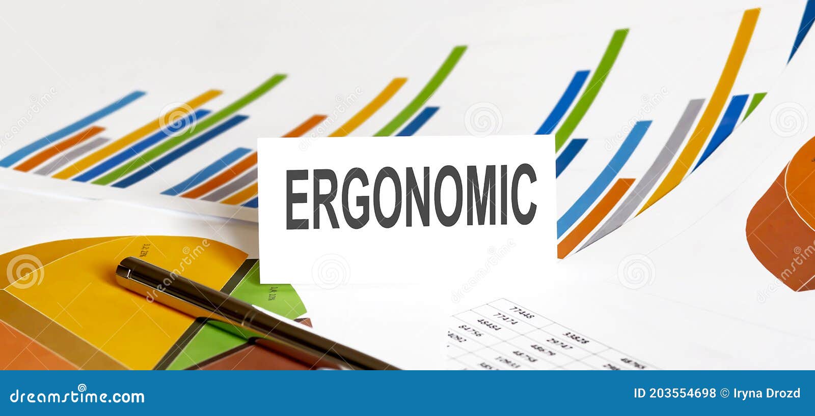ERGONOMIC Text on Paper on Chart Background with Pen Stock Photo ...