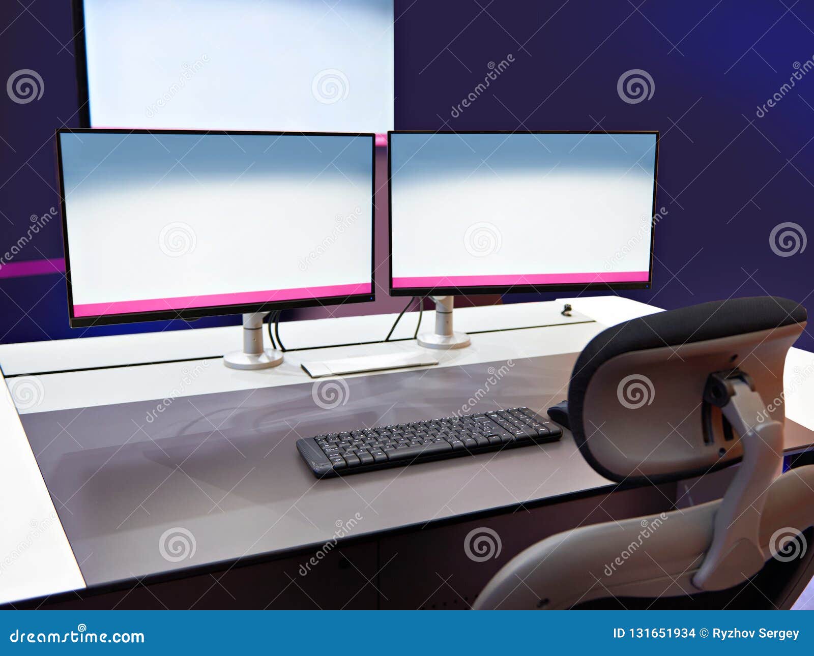 Ergonomic Workplace With Keyboard And Monitors Stock Photo ...