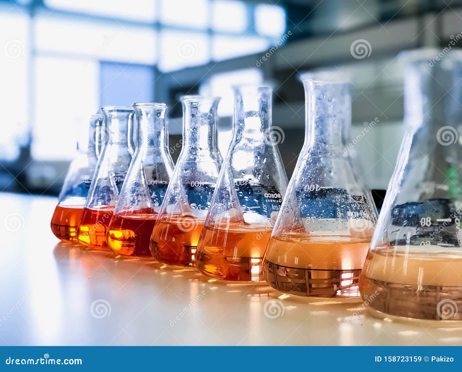 The Erlenmeyer or Conical Flask on Bench Laboratory, with Gradient ...