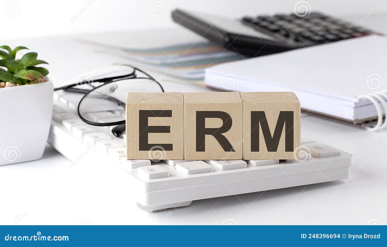 ERM Written on a Wooden Cube on Keyboard with Office Tools Stock Photo ...