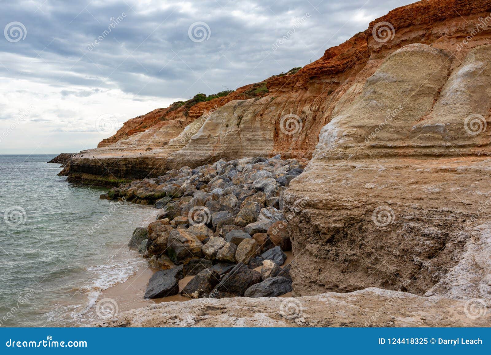 The Eroding Cliffs at Port Noarlunga and the Protective Rocks Pl Stock ...