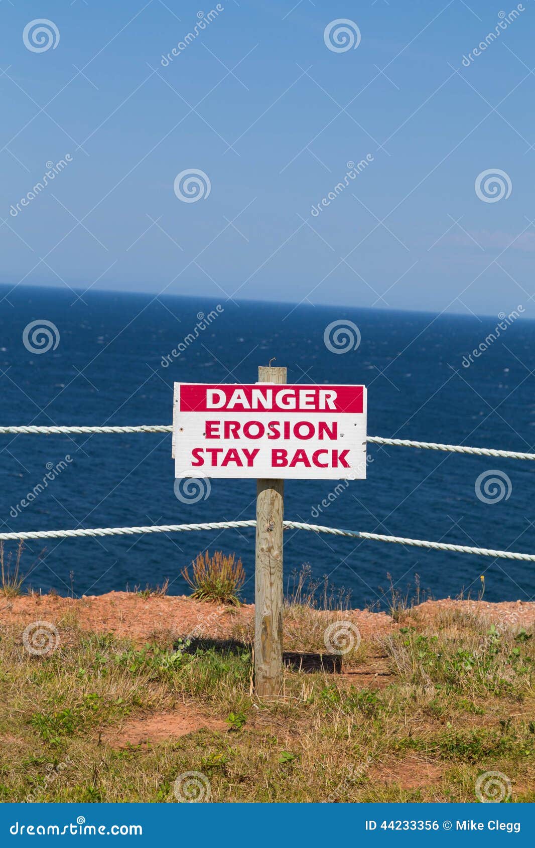 Erosion Stay Back Sign stock photo. Image of water, text - 44233356