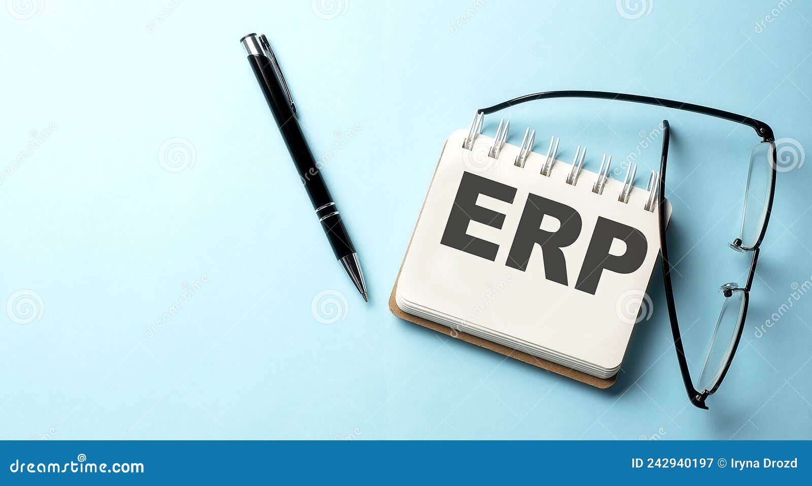 ERP Text Written on a Notepad on the Blue Background Stock Image ...
