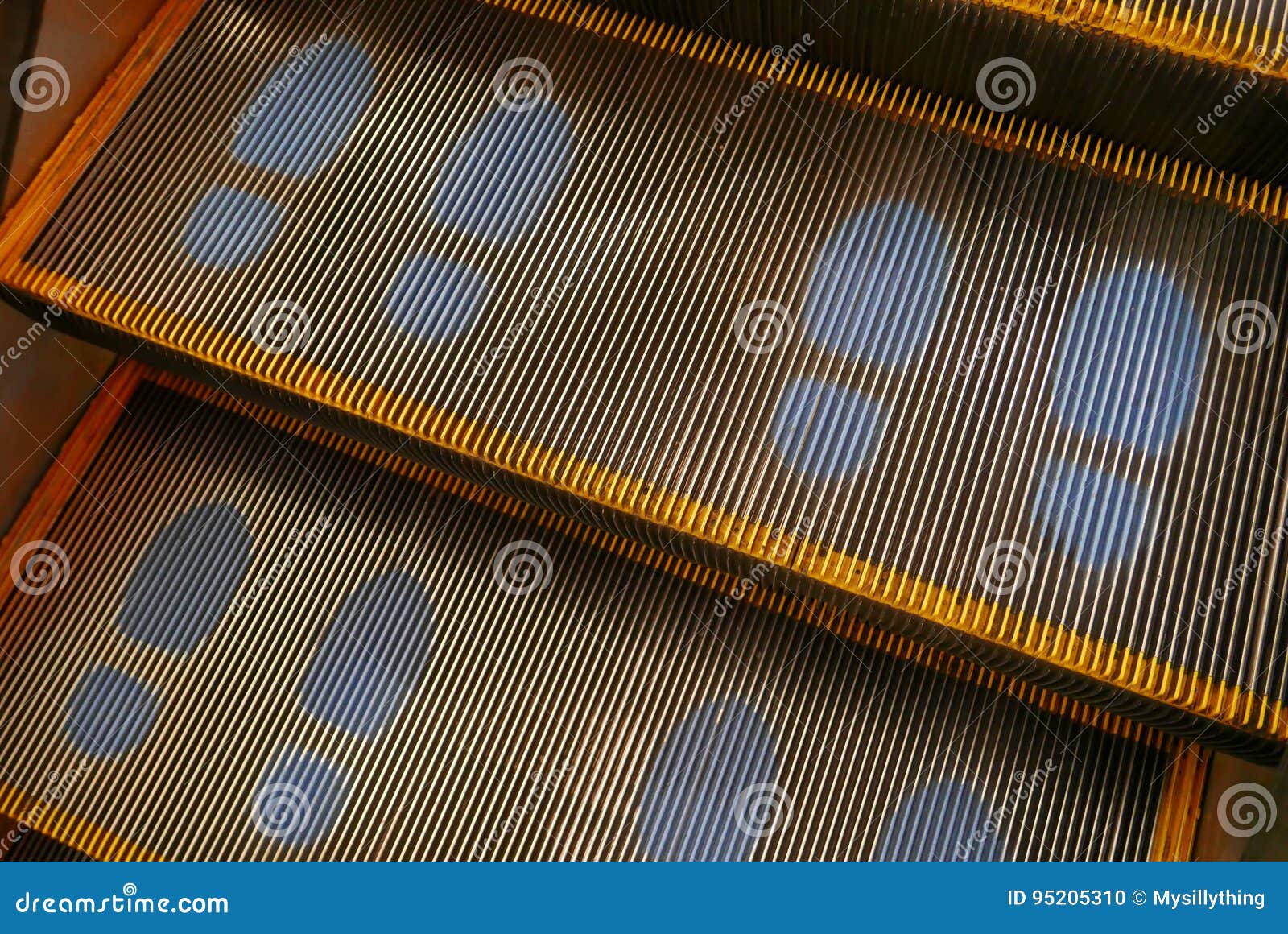 Escalator with Blue Footprint Screen on Step Stock Photo - Image of ...