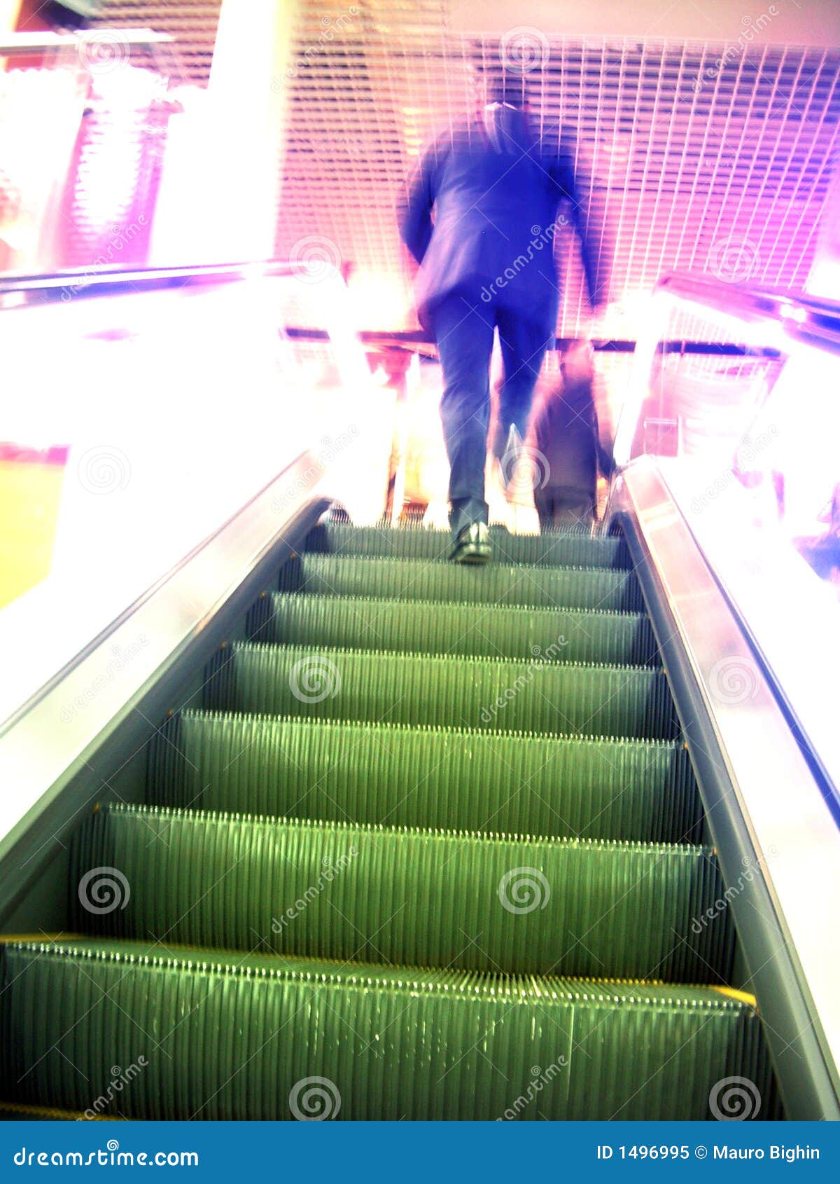 Escalator and Blurry Man in Movement Stock Image - Image of motion ...