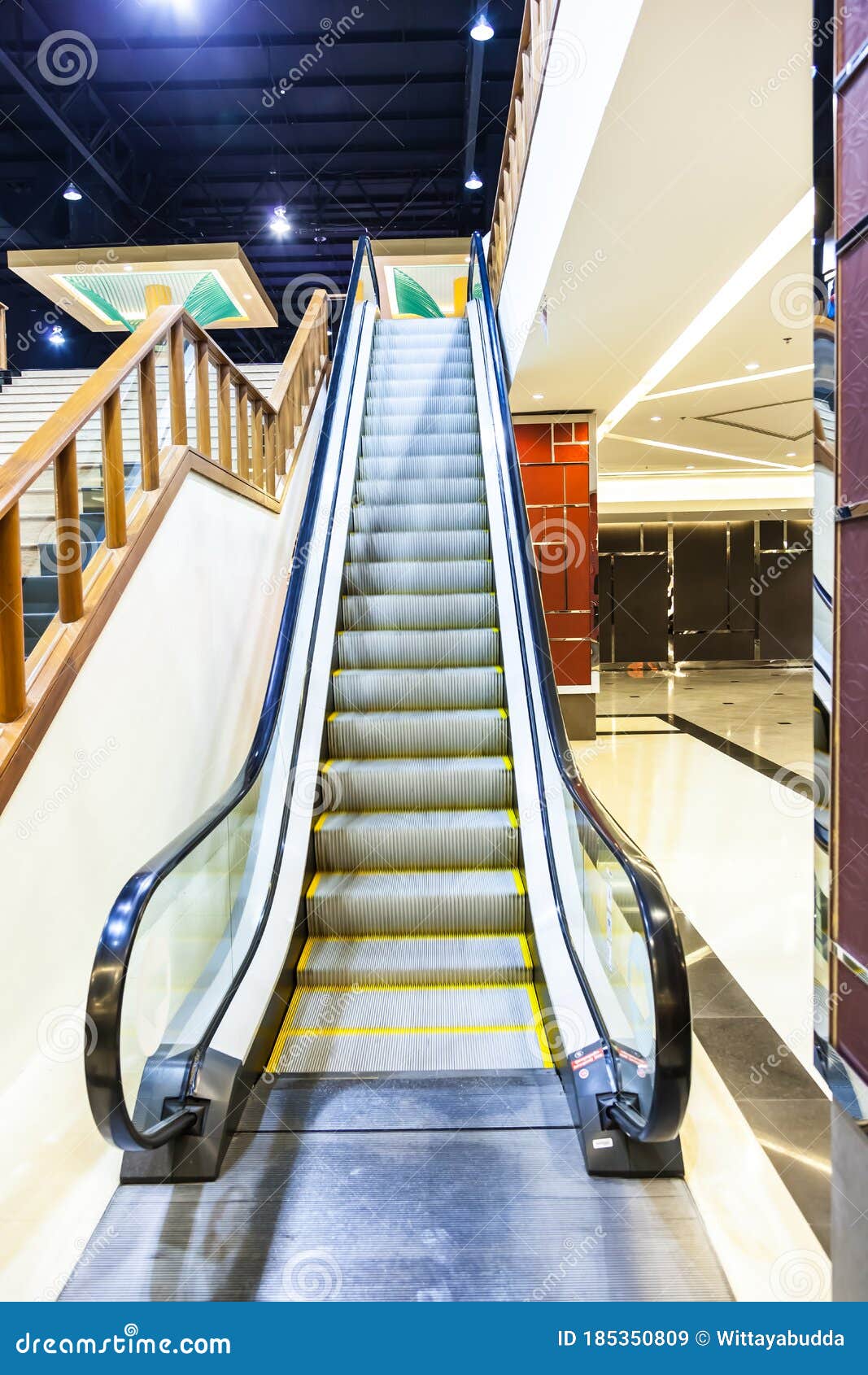 Escalator in the building stock image. Image of design - 185350809