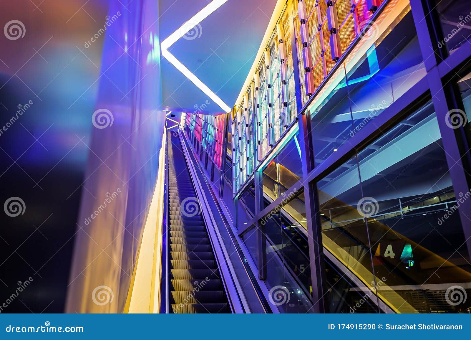 Escalator with LED Light beside in Technology Abstract Neon Colorful ...