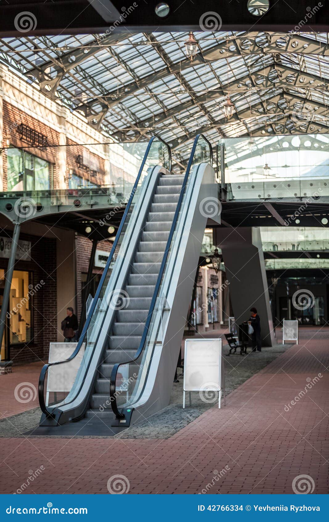 Escalator at shopping mall stock photo. Image of market - 42766334