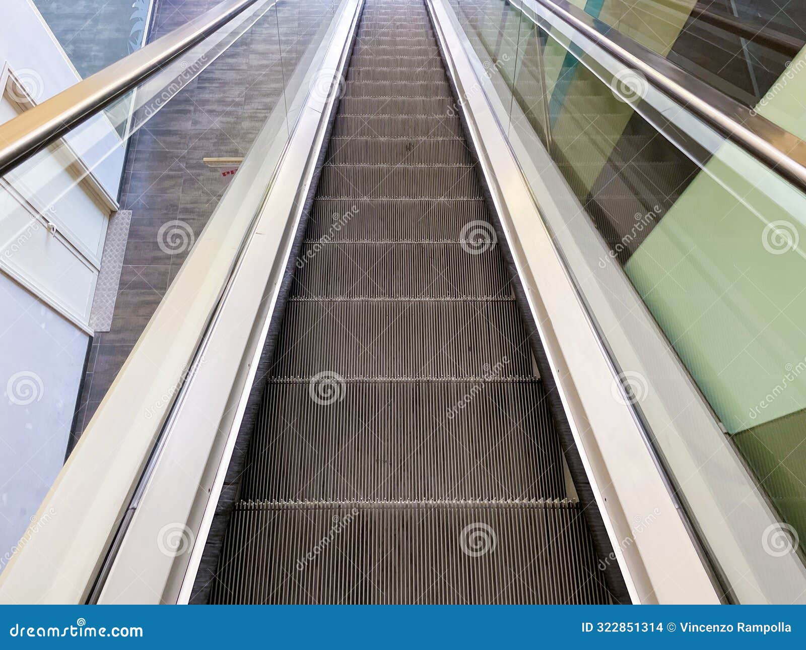 Escalator steps stock photo. Image of upper, people - 322851314