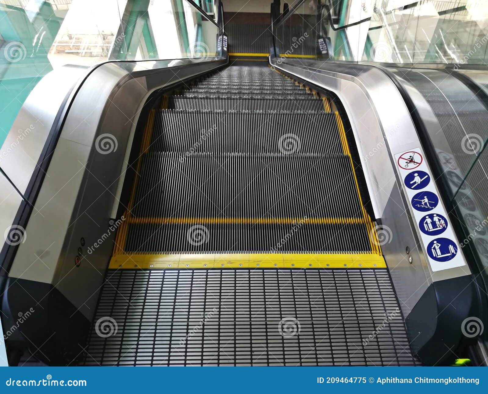 Escalator with Warning Sign in the Building Stock Image - Image of ...