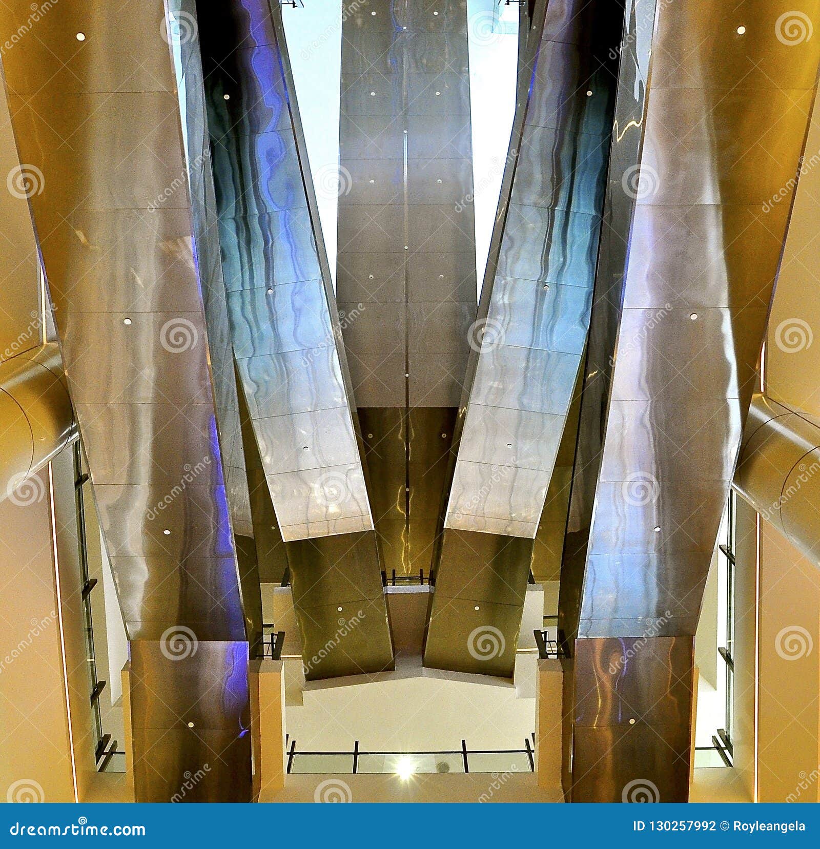 Escalators from below stock photo. Image of building - 130257992