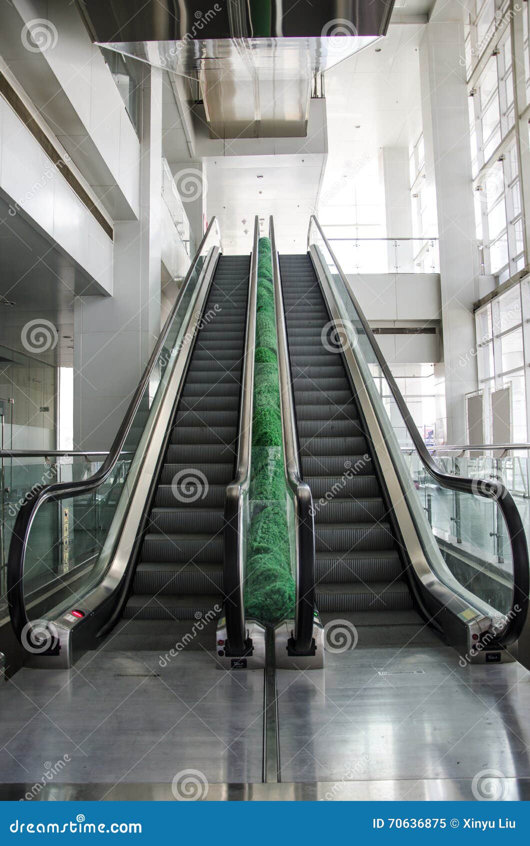 Escalators in the building stock image. Image of post - 70636875