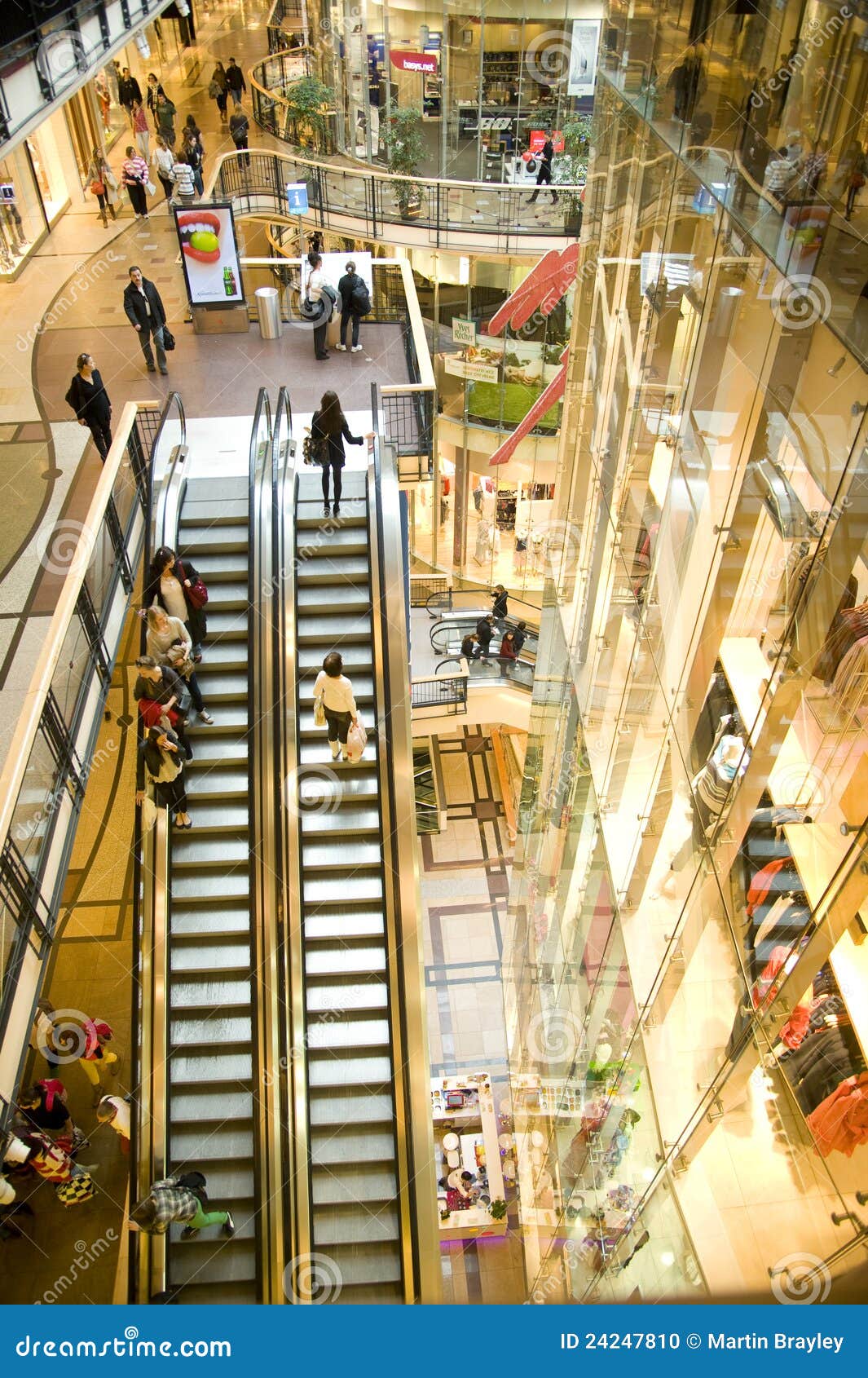 Escalators in the mall. editorial image. Image of consumers - 24247810