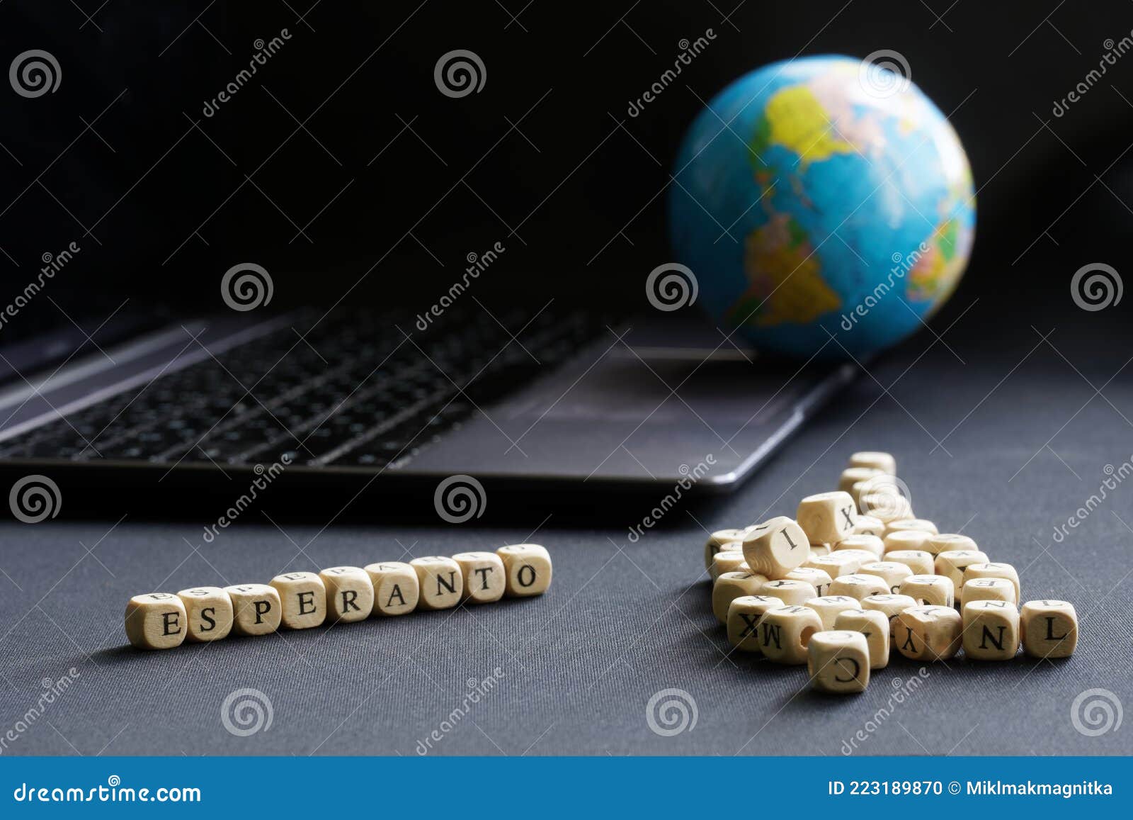 Esperanto Inscription Next To an Open Laptop and a Globe. the Concept ...
